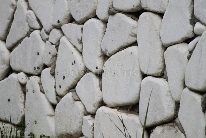 Wall Made Using White, Rounded White Stones. Stock Image - Image of ...