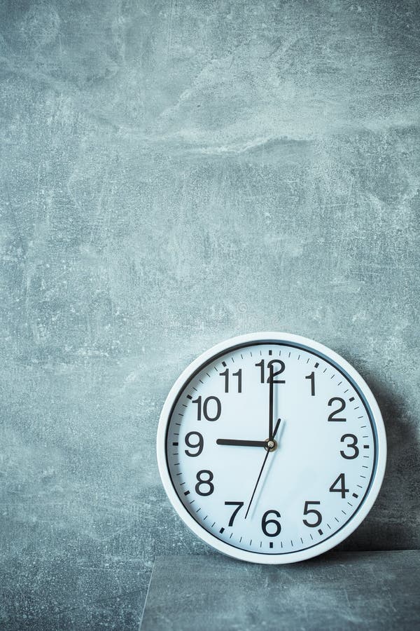 Wall Clock at Grey Shelf with Abstract Background Stock Photo - Image ...
