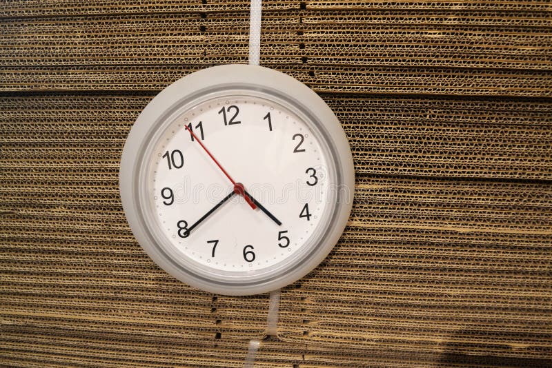 Wall Clock Hanging on the Carton Boxes Stock Photo - Image of package ...