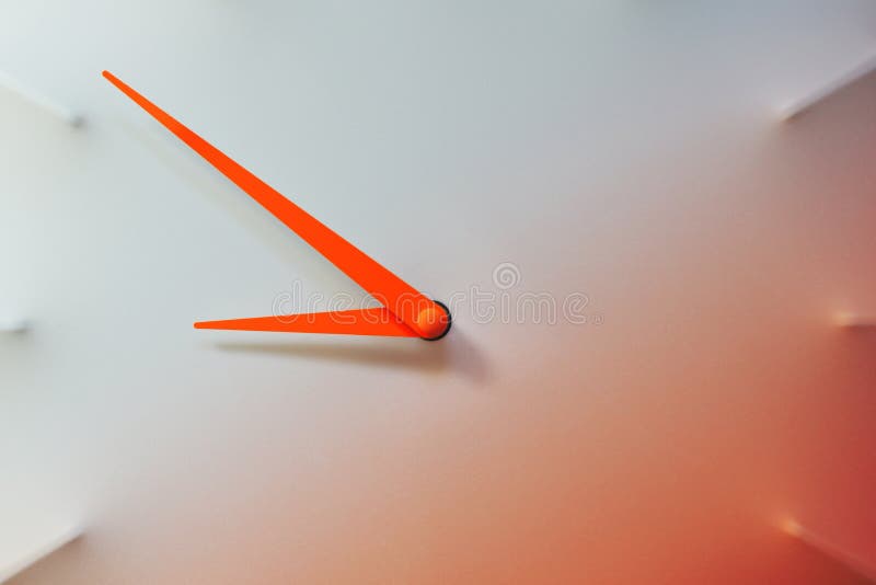 Wall Clock with Orange Arrows Stock Photo - Image of clock, fabric ...