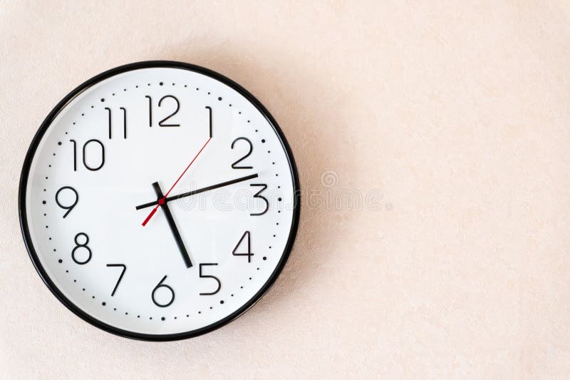 Wall Clock with a White Dial, Black Edging and Black Arrows Free Space ...