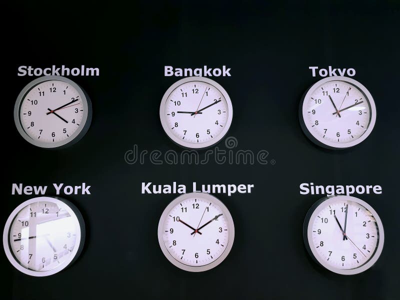 Wall Clocks Showing Different Time of Many Cities in the World on Black ...
