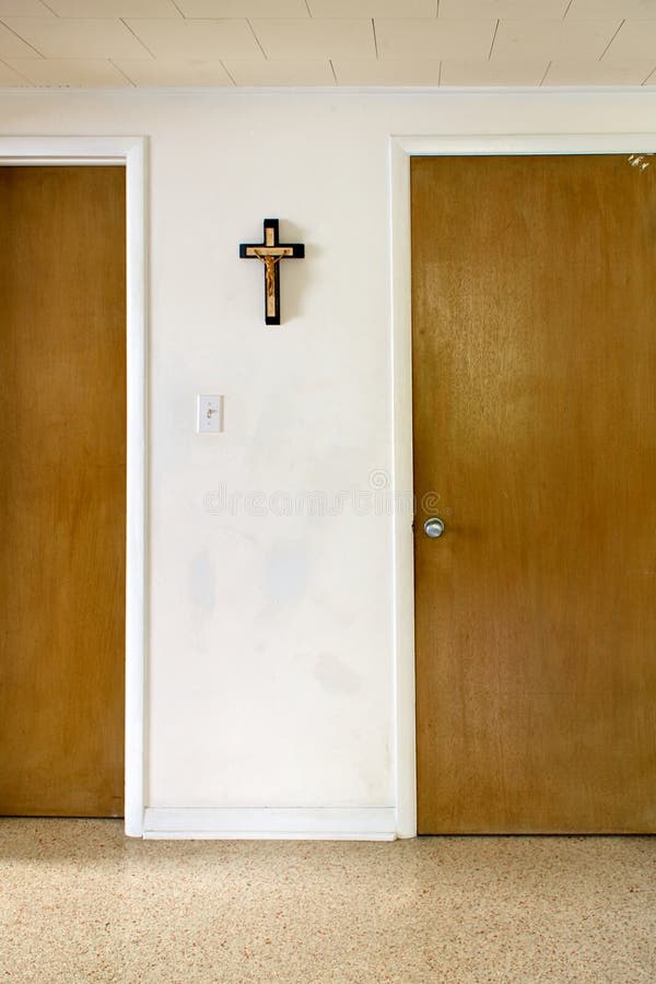 Wall with cross and doors stock photo. Image of closed - 14176722