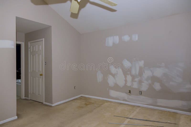 Wall with Damage Spreading Plaster To Damaged Wall, Repairing Works ...