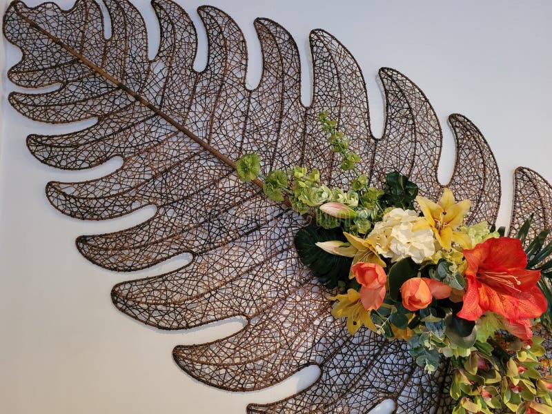 Wall Decor Using Giant Leaf with Flowers Stock Photo - Image of leaf ...