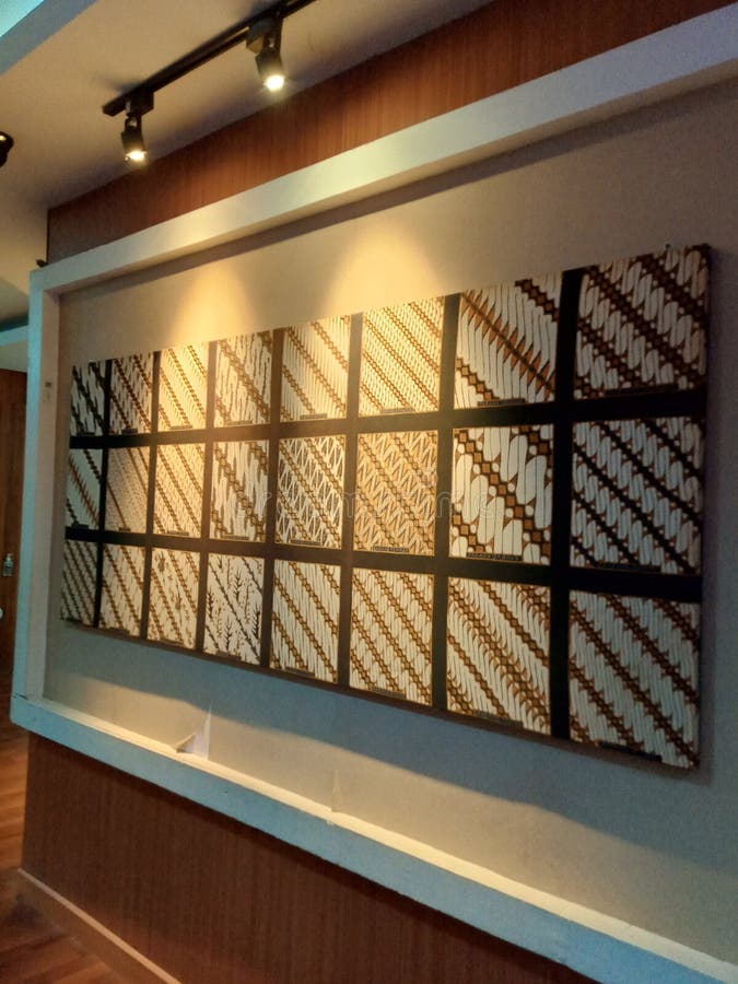 A Wall Display Showcases Various Traditional Indonesian Batik Patterns ...