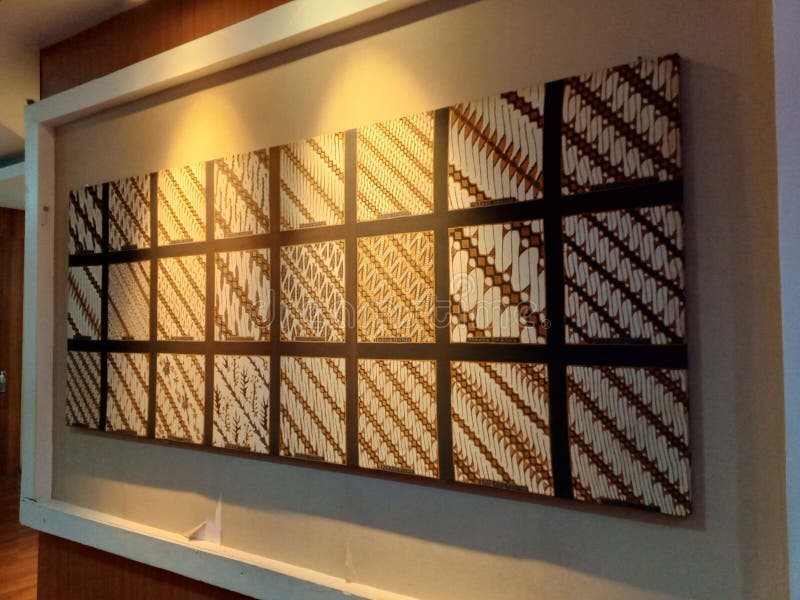 A Wall Display Showcases Various Traditional Indonesian Batik Patterns ...