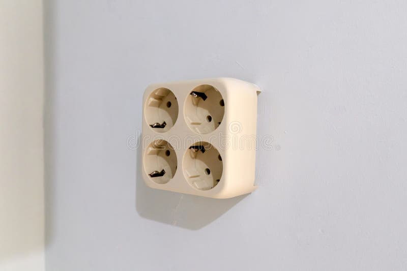 Wall Electrical Socket with Four Plug Holes Stock Image - Image of ...