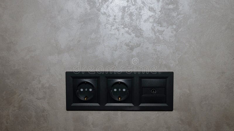 Electrical Outlet on a Gray Venetian Wall. Antenna for Tv in the Form ...