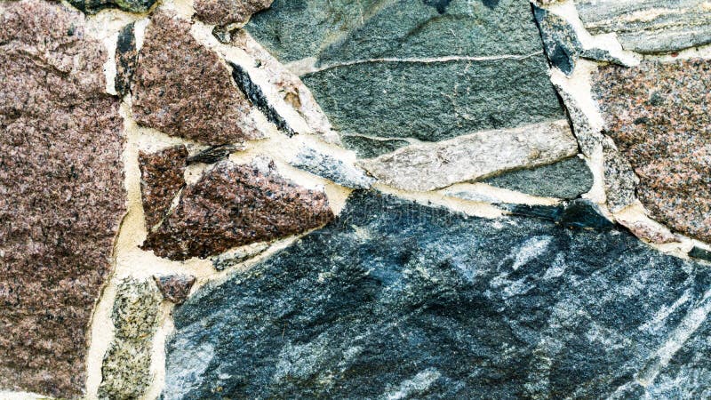 Wall of field stones stock image. Image of design, stone - 148860621