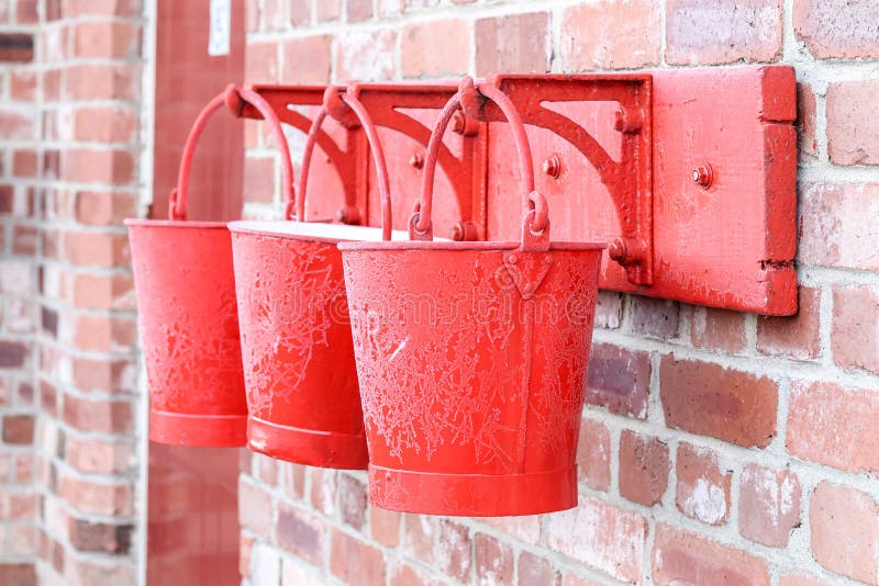 Wall Fire Buckets stock photo. Image of fighting, water - 271790696