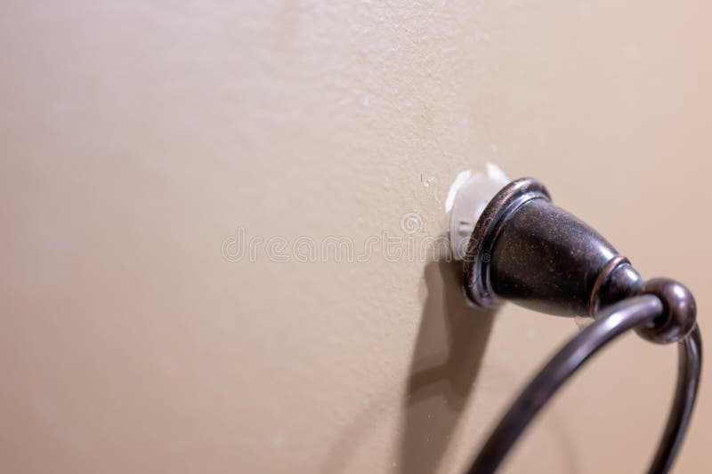 Wall Fixture Being Pulled Out of Drywall because of a Bad Installation ...