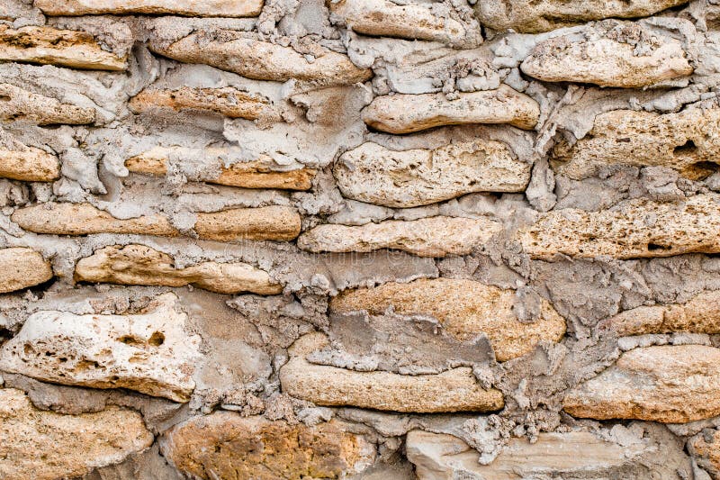Wall of Flat Different Shell Stones on Cement Mortar, Close-up ...