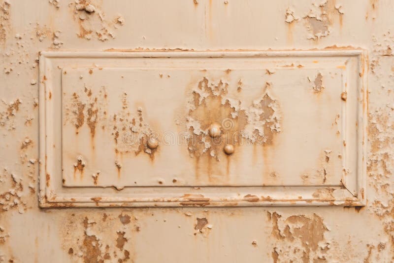 A Wall with a Frame that is Covered in Rust and Has Three Holes in it ...