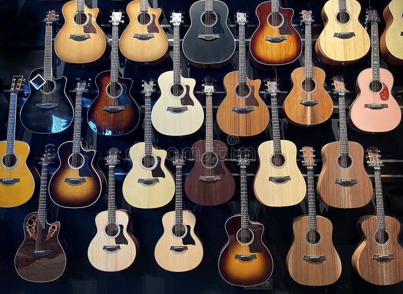A Wall Full of Acoustic Guitars of Different Models and Types of Wood ...