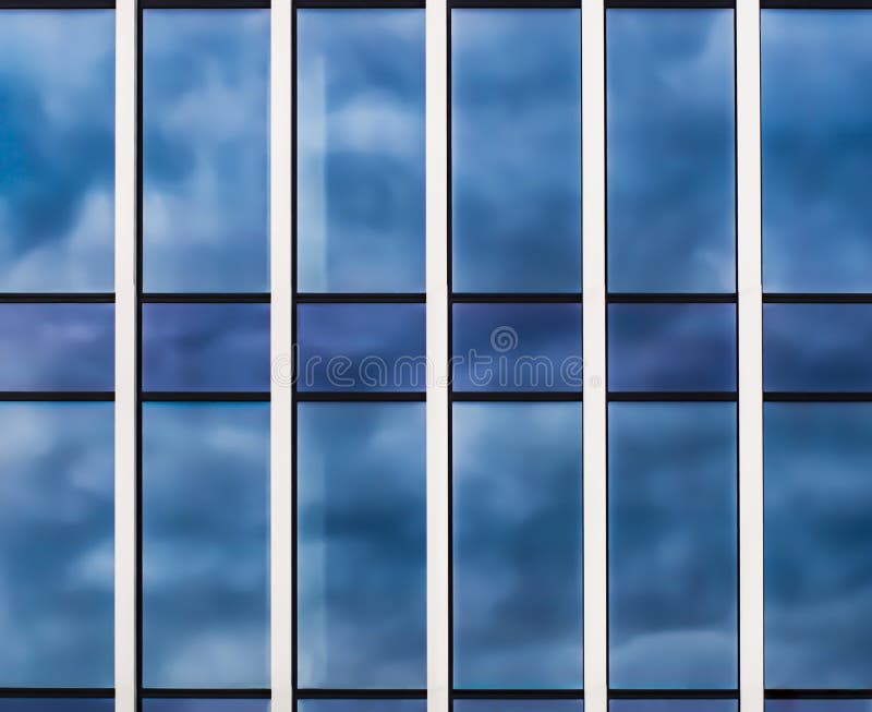 Wall with Glass Windows and the Reflection of Clouds Stock Photo ...