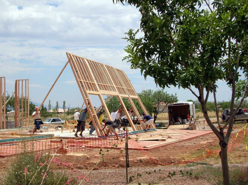 Workers Raising House Wall Stock Photos - Free & Royalty-Free Stock ...