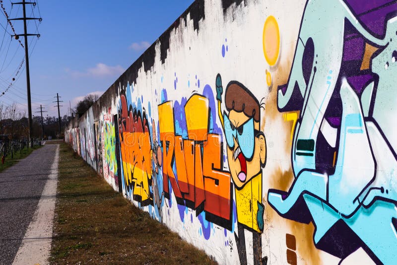 Wall with Graffitis Along a Path Editorial Stock Image - Image of ...