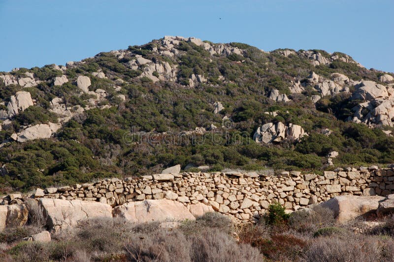Wall of granite rocks stock image. Image of earth, green - 102404427