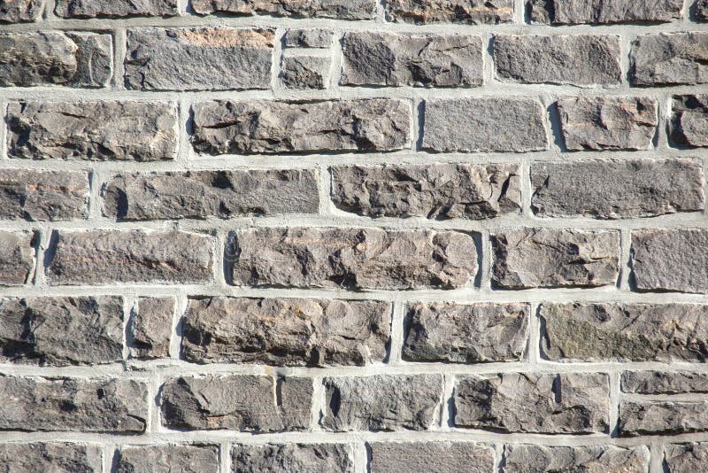 Wall of gray brick masonry stock photo. Image of stonemason - 132039686