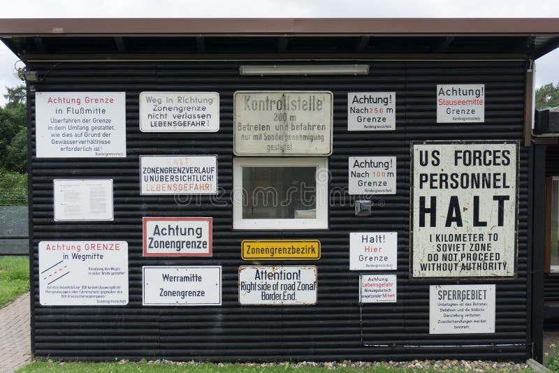 On the Wall Hang Various Signs and Information Boards of a German State ...