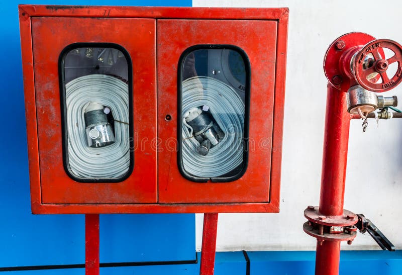 Wall Hanging Fire Extinguisher, Fire Safety and Emergency Equipment Install in Red Blue Box Wall ...