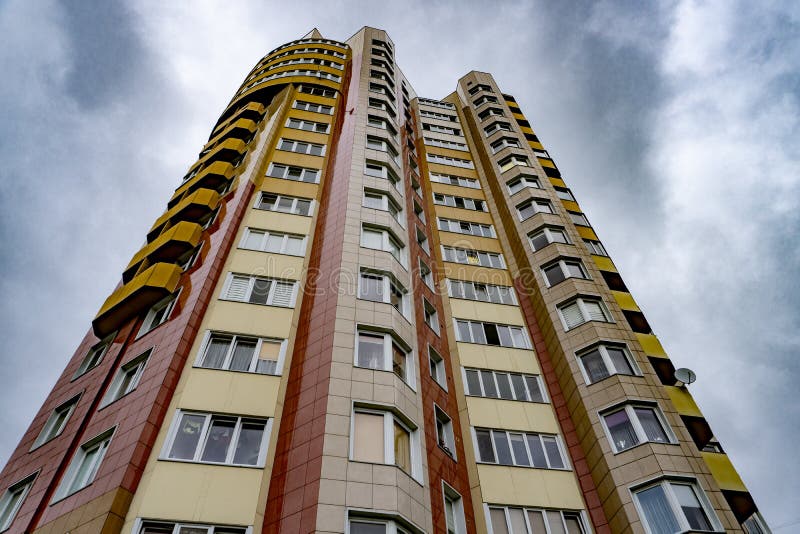 The Wall of a High-rise Apartment Building Against the Sky Stock Photo ...