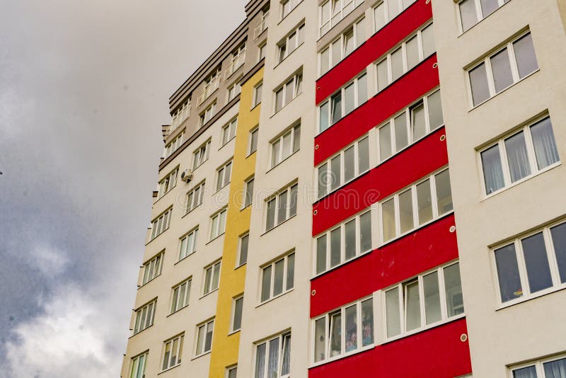 The Wall of a High-rise Apartment Building Against the Sky Stock Photo ...