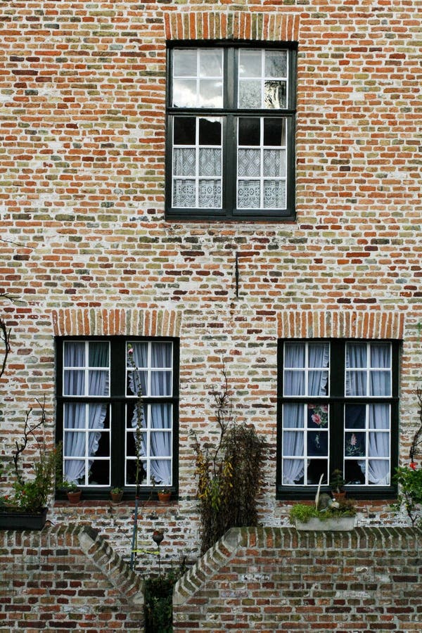 Wall of House from Red Brick with Three Windows Stock Photo - Image of ...