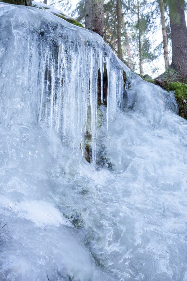 Wall of ice at forest rock stock image. Image of transparent - 84424929