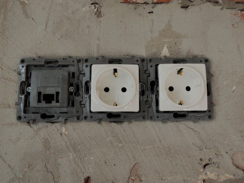 Electrical Outlet Block Mounted in Concrete Wall Stock Photo - Image of ...