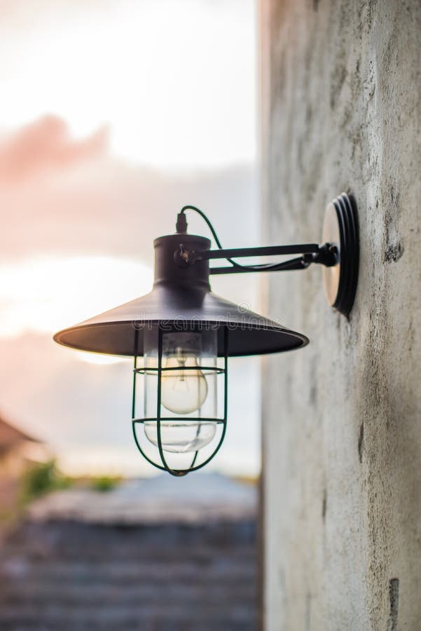 Wall lamp on sunlight stock image. Image of atmosphere - 74577563