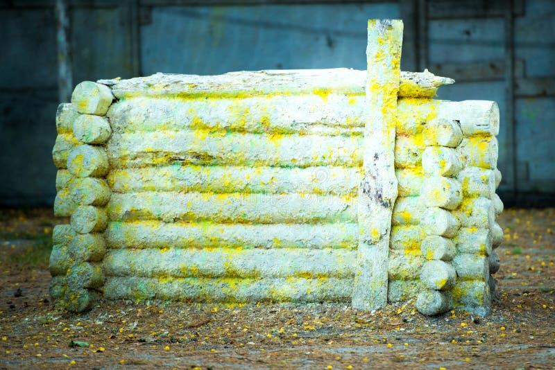 The Wall of Large Logs is Yellow. in the Stains of Paint. Stock Image ...