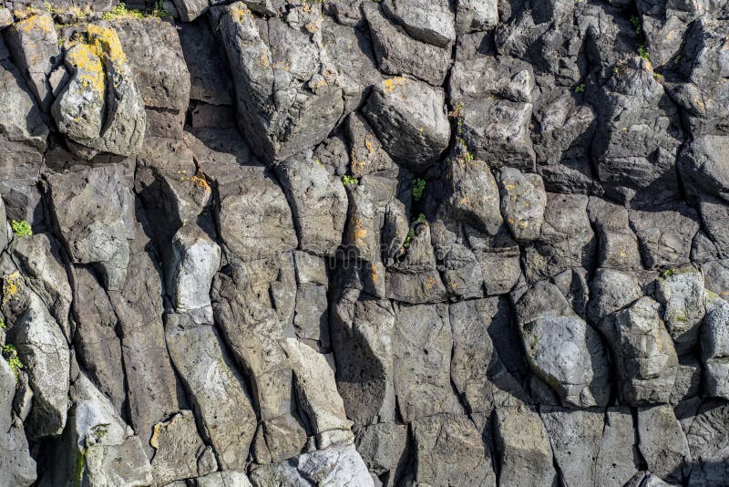 Wall of Lava Rock in Sunshine Stock Photo - Image of eroded, texture ...