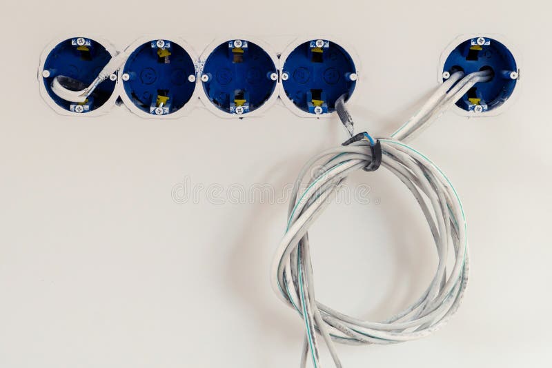 The Wall is of Light-colored Plaster and Has Several Outlets ...