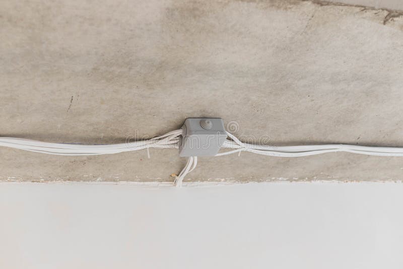 Wall is of Light-colored Plaster and Has Several Outlets. Professional ...