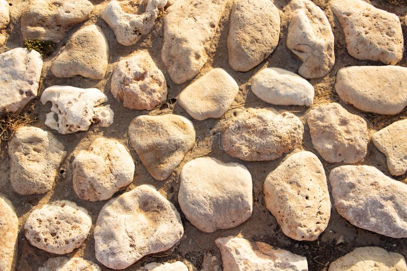Wall of Light Round Smooth Stones Stock Photo - Image of strong, volume ...