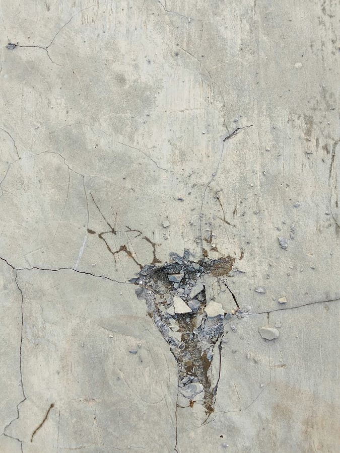 A Wall Looks a Little Broken Due To the Impact. Stock Image - Image of ...