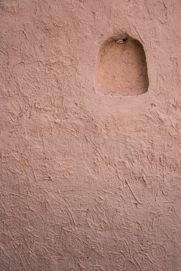 The Wall is Made of Brown Clay with a Light Box. Stock Image - Image of ...