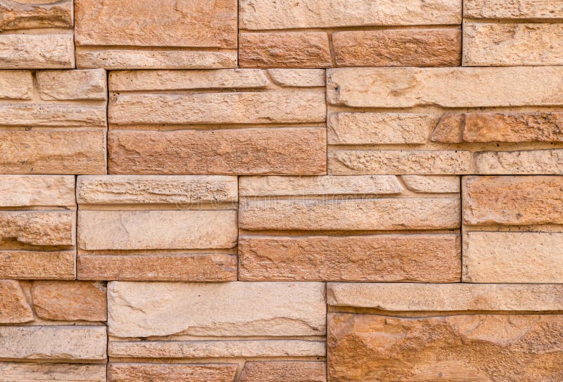 The Wall is Made of Decorative Facing Stone Such As Sandstone or Slate ...