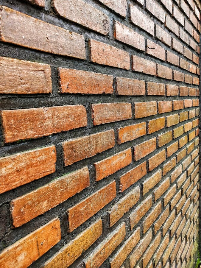 Wall Made from Exposed Bricks Stock Image - Image of orange, texture ...