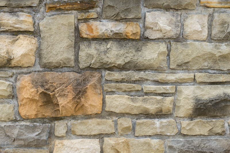 A Wall Made from Irregular Stone Blocks. Assortment of Different Shape ...