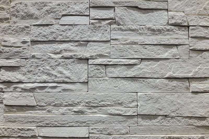 The Wall is Made of Multi-layered Natural Stone. Stone for Building a ...