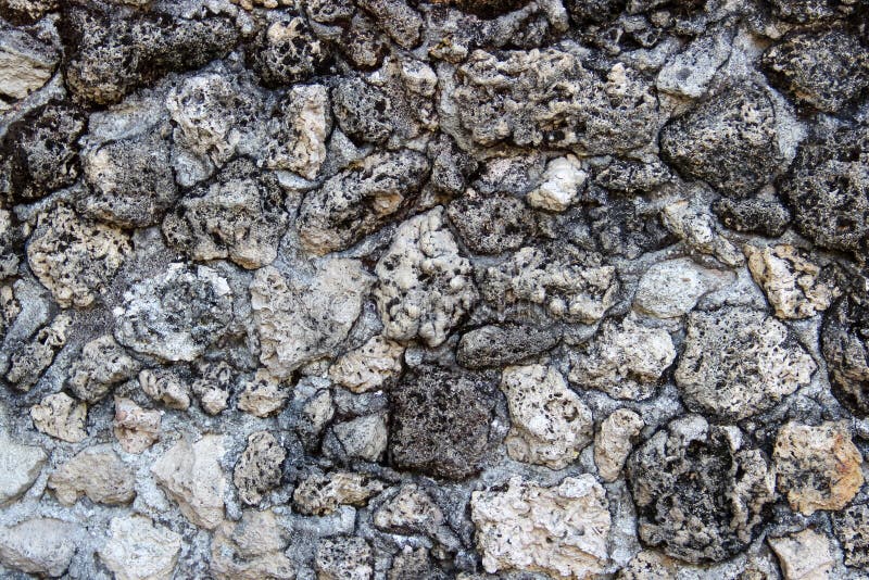 Wall Made of Naturally Perforated Stones Stock Photo - Image of coarse ...