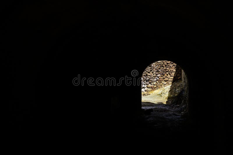 Wall Made Out of Stones Seen through the Door of a Dark Building Stock ...