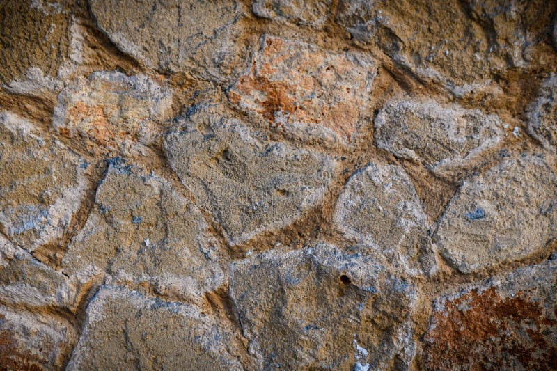 Wall made of real stone 5 stock image. Image of rust - 324638599