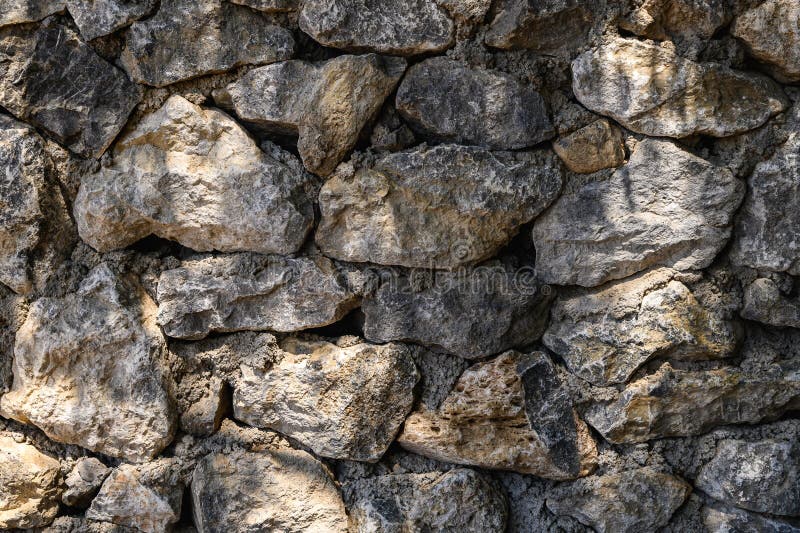 Wall Made of Real Stone Close-up Sun Rays Stock Photo - Image of texture, cesarean: 338259110