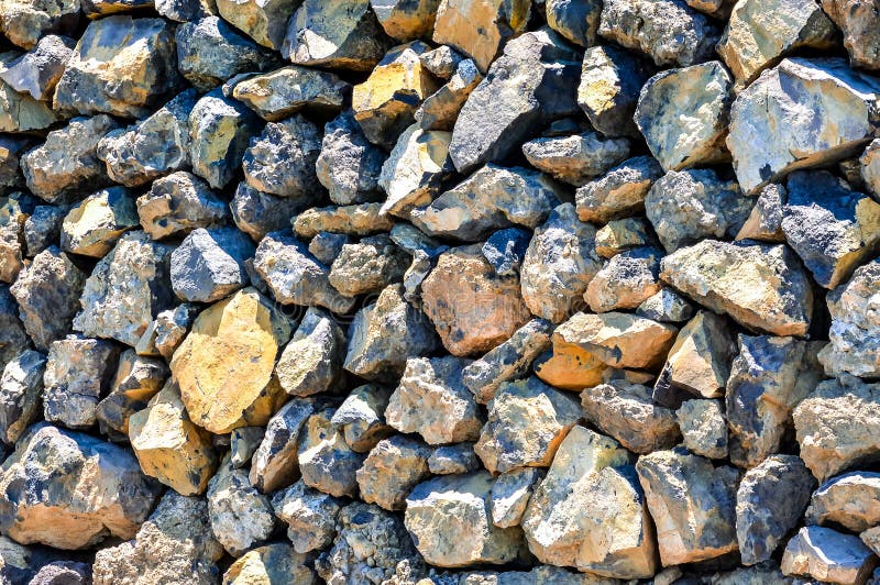 A Wall Made of Rocks with a Lot of Different Sizes Stock Image - Image ...