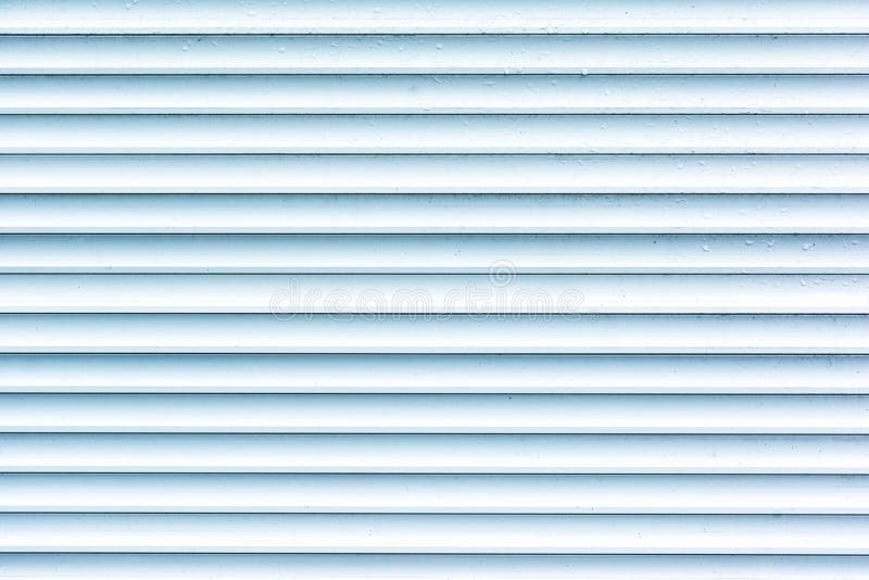 A Wall Made of Smooth Slats. Background Light Blue Horizontal Bars ...