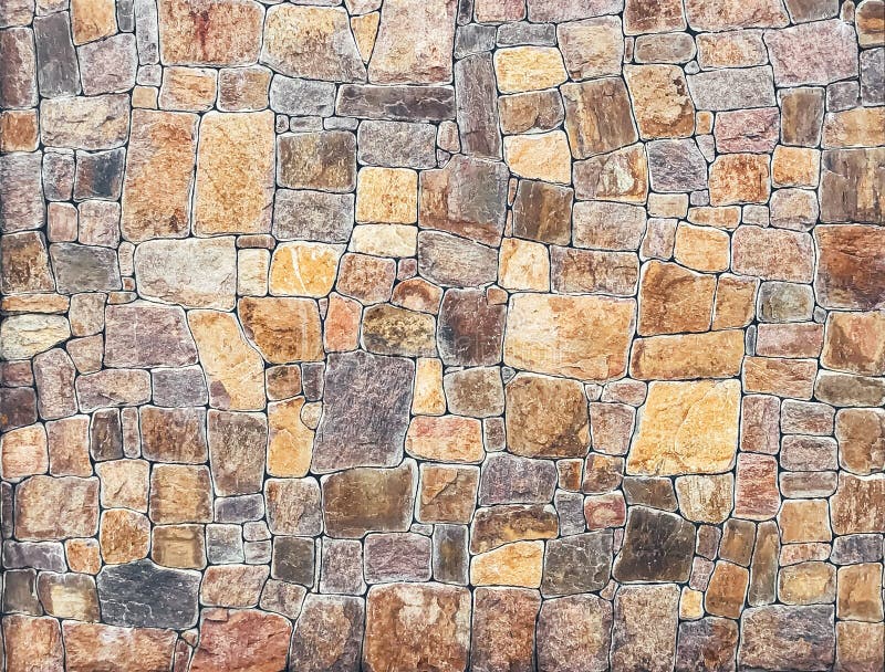 A Wall Made of Stone Blocks with a Brown and Tan Color Stock Photo ...